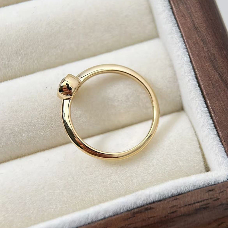 Simple Round Cut Golden Tone Engagement Ring – Juluro
